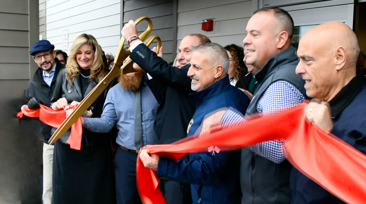 Community celebrates reopening of reimagined library – The Long Island ...
